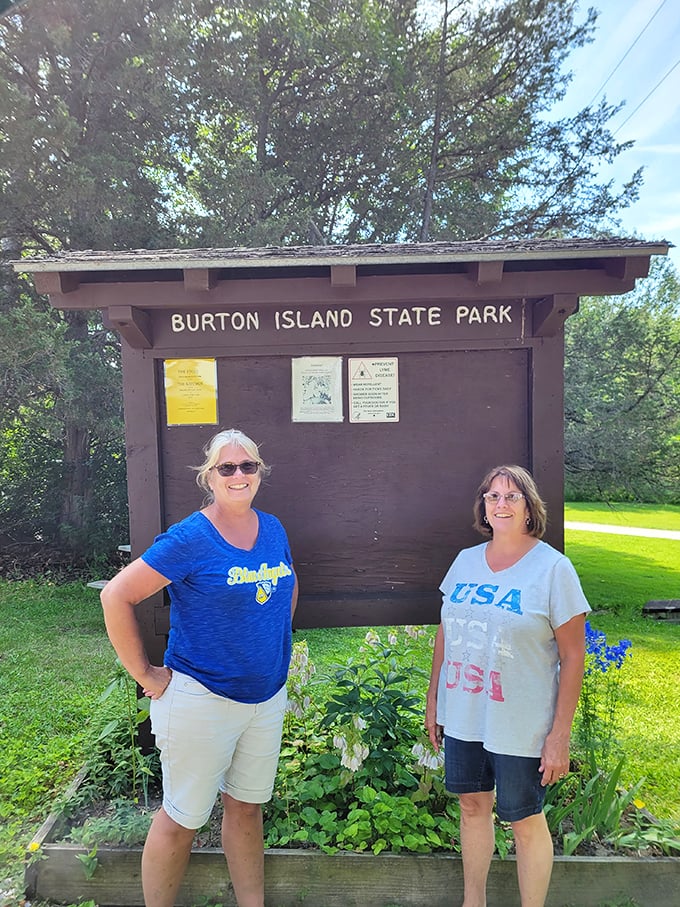 Welcome to Burton Island, where the sign photo is mandatory and the smiles are genuinely earned.