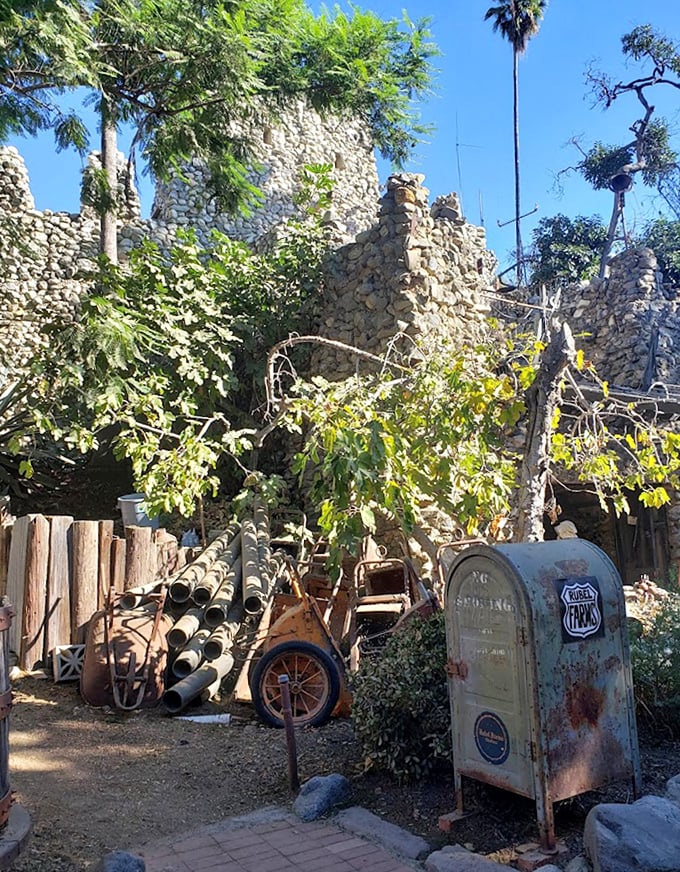 Not your average mailbox! This vintage postal relic stands guard outside the castle walls, probably handling more tourist photos than actual mail these days.