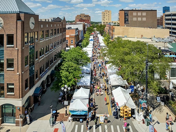 The famous Ann Arbor Art Fair transforms downtown streets into an outdoor gallery celebrating creativity and community.