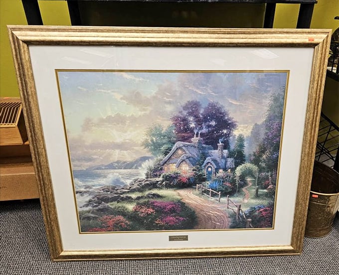 Someone's discarded Thomas Kinkade is your new conversation piece. Nothing says "eclectic taste" like thrift store art with a backstory.