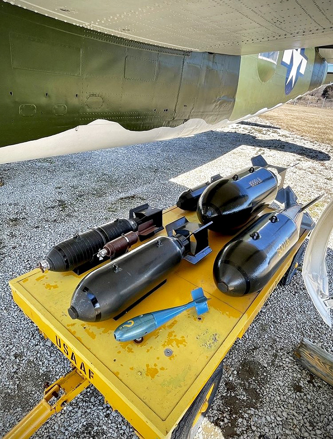 Weapons display showing the evolution of aerial ordnance. From "Dear John" to "Dear Enemy"—these packages definitely weren't filled with cookies from home.