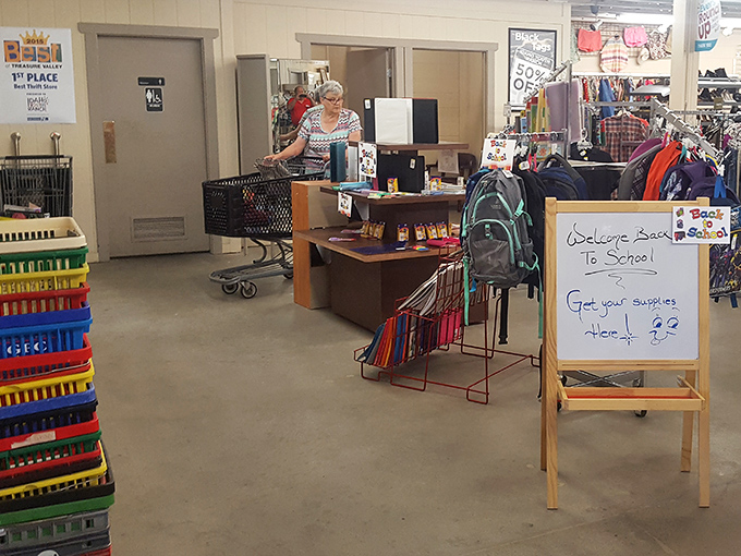 The school supply section transforms into a command center during August. That whiteboard sign might as well say "Parents, salvation this way!"