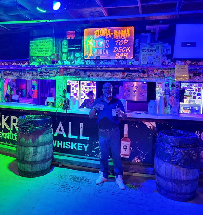 Under the glow of neon and nostalgia, the Top Deck Bar serves liquid courage to those brave enough to attempt karaoke later.