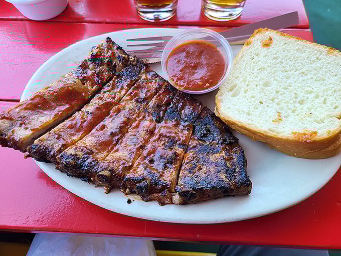 These aren't just ribs—they're edible evidence that patience, smoke, and fire create magic that no microwave ever could.