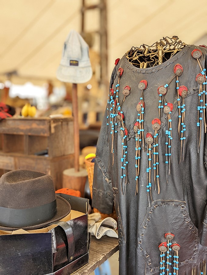This Native American-inspired ceremonial jacket tells tales of craftsmanship and culture. Paired with a classic hat for the complete time-travel look.