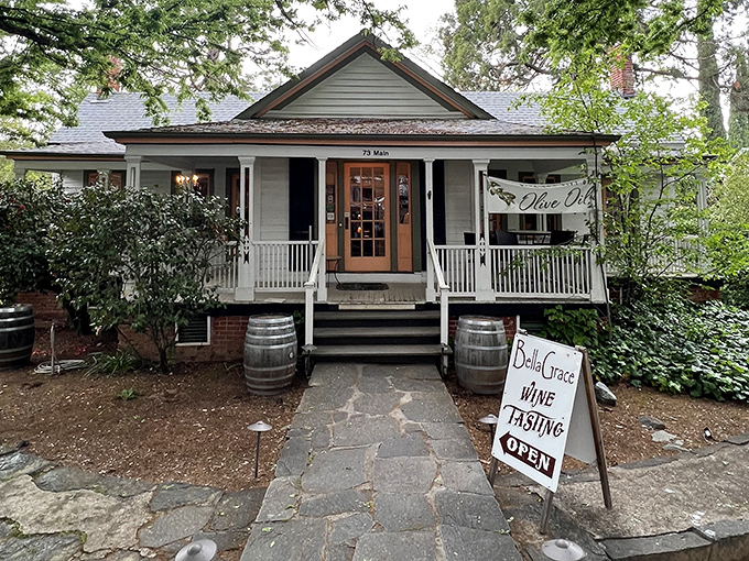 Bella Grace Vineyards' tasting room occupies a historic cottage where wine barrels flank the entrance – a perfect marriage of Gold Country history and viticulture.