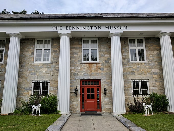 Museum with columns and decorative animals guarding the entrance &ndash; culture with a side of whimsy. 