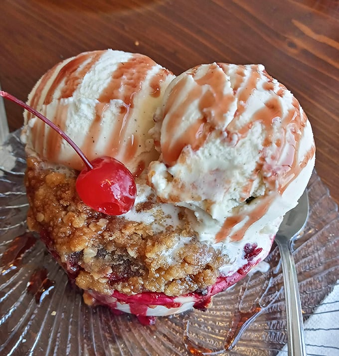 Berry cobbler crowned with vanilla ice cream &ndash; because even seafood restaurants know how to end on a sweet note.