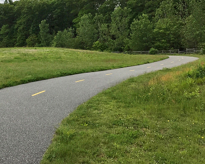 The Blackstone River Bikeway offers a smooth ride through history, where industrial revolution meets recreational revolution.
