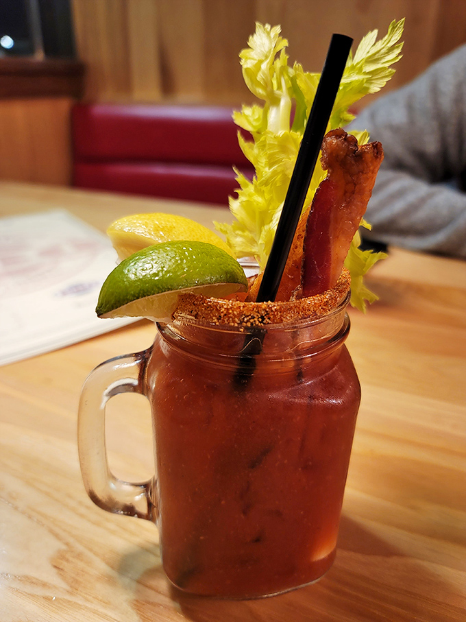 Not just a Bloody Mary &ndash; it's a liquid brunch with garnishes that could qualify as a small appetizer plate. That bacon garnish is living its best life.