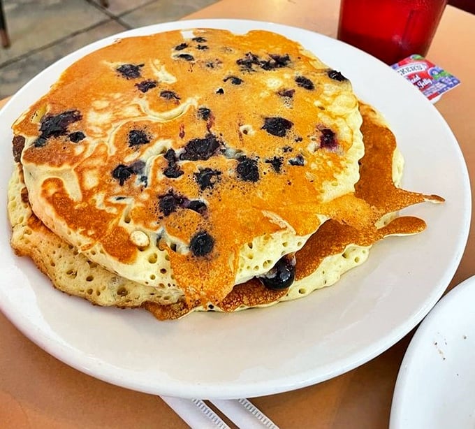 Blueberry pancakes that look like they're auditioning for a breakfast cereal commercial&mdash;golden, fluffy, and studded with bursts of fruit perfection.