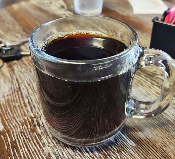 Strong coffee in a clear mug&mdash;the perfect supporting actor in the blockbuster production that is pie consumption.