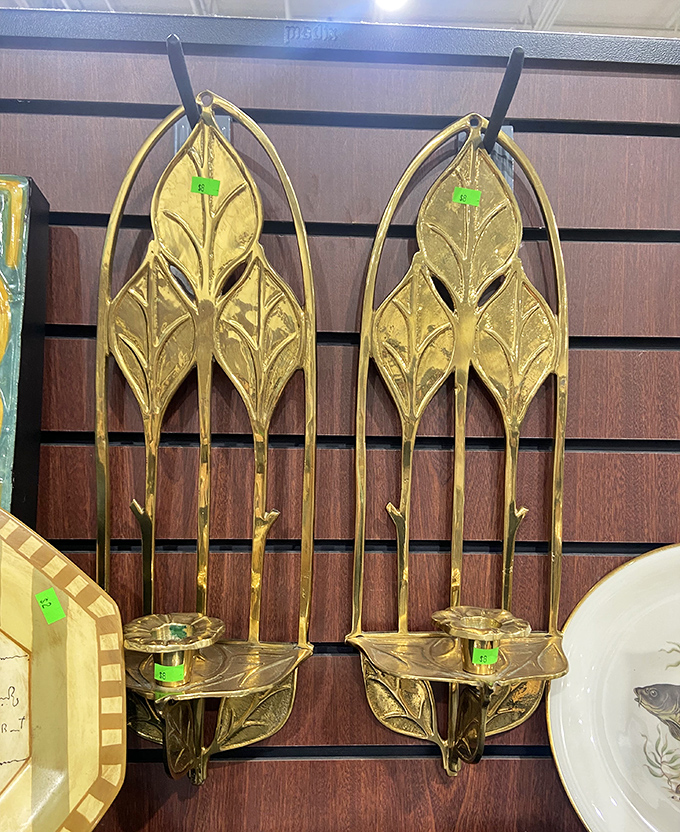 These art deco brass candle holders scream "I have excellent taste" without screaming "I emptied my bank account."
