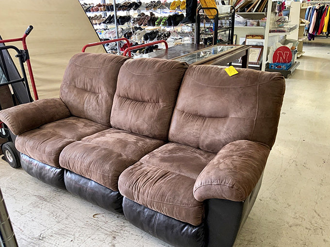 The brown recliner sofa&mdash;perfect for Netflix marathons or unexpected naps. Like sitting in a warm hug from a friendly bear with excellent taste.