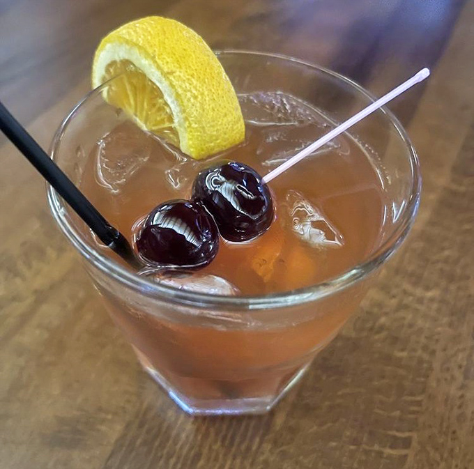 This isn't just a cocktail; it's liquid nostalgia with cherries on top. The kind of old-fashioned that would make Don Draper nod in silent approval.