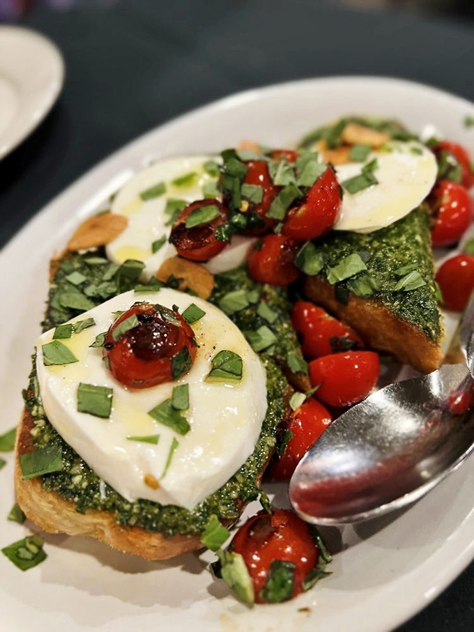 Bruschetta topped with fresh mozzarella and roasted tomatoes&mdash;Italy's greatest gift since the Renaissance, only more delicious.