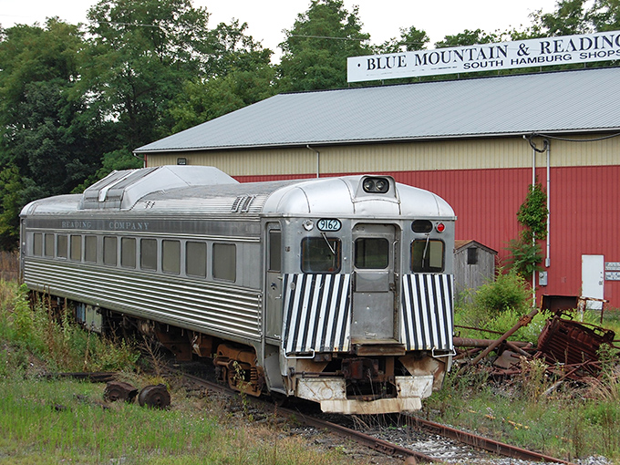 The streamlined silver Budd Rail Diesel Car represents mid-century modern transportation at its finest&mdash;the Cadillac of passenger rail service.