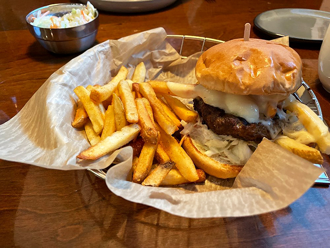 This isn't just a burger&mdash;it's an architectural achievement of beef, cheese, and golden fries that makes fast food chains weep with inadequacy.