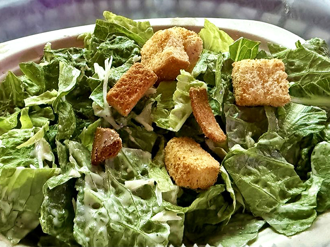 Even salads get the star treatment here &ndash; crisp romaine playing host to golden croutons in a Caesar worthy of the seafood empire.