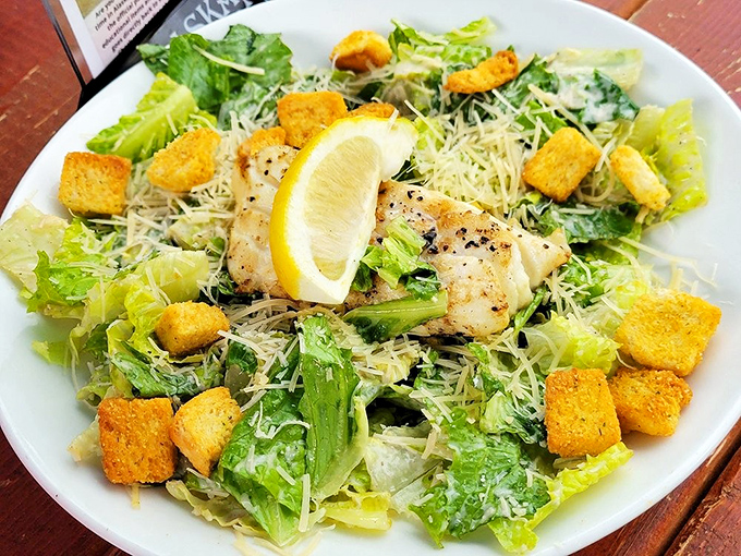 This Caesar salad with grilled fish isn't just eating healthy&mdash;it's eating happy. The perfect lighter option when you want to save room for another round.