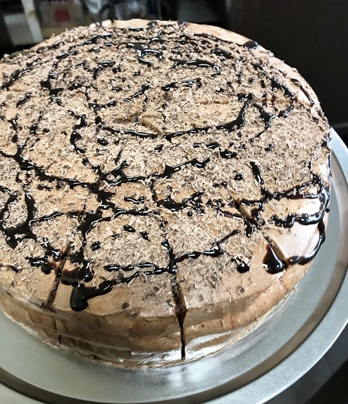 This chocolate cake with its Jackson Pollock drizzle pattern says "save room for dessert" in the most convincing way possible.