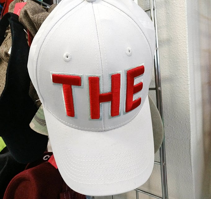 Just a simple white cap with "THE" emblazoned on it. The perfect conversation starter&mdash;let everyone else fill in the blank.