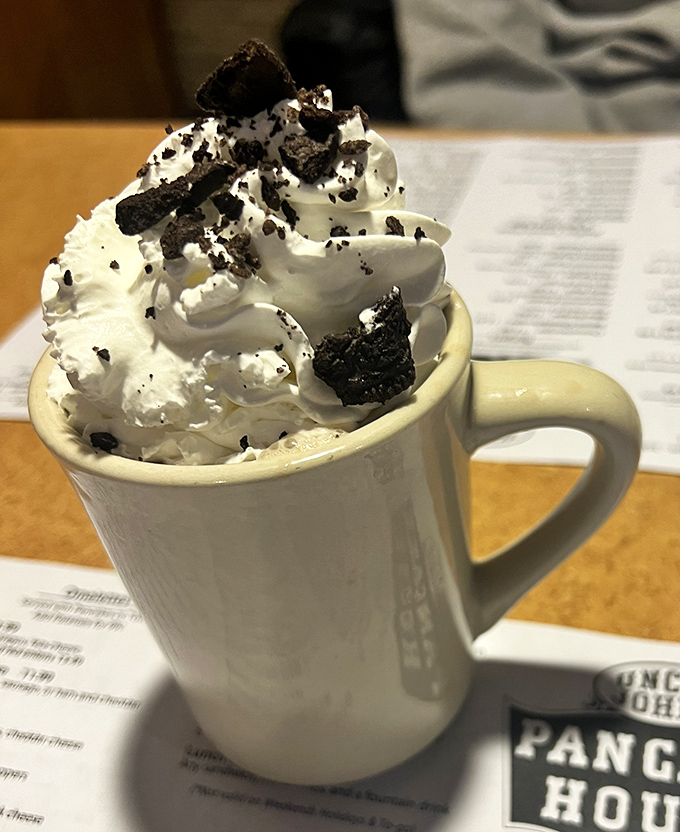 This isn't just hot chocolate&mdash;it's a mountain of whipped cream with cookie avalanches waiting to make your morning magical.