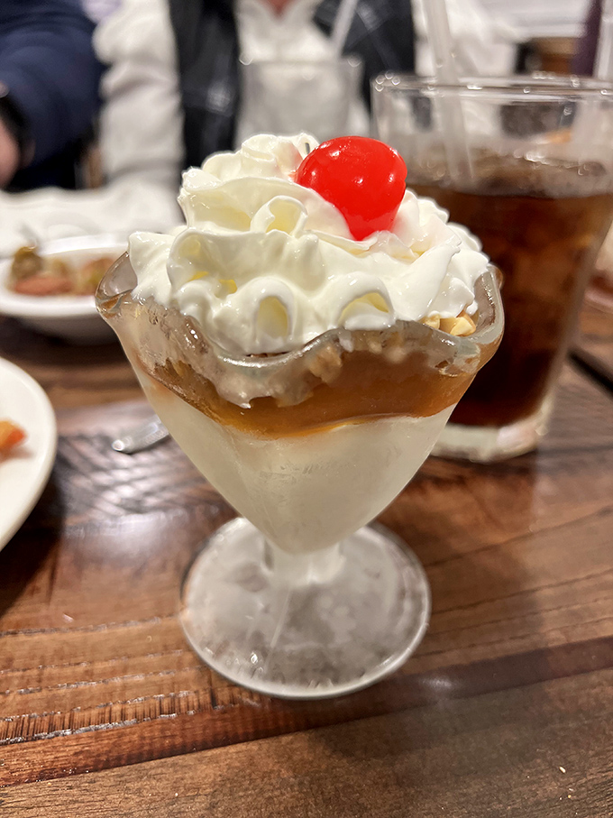 This sundae doesn't just satisfy a sweet tooth&mdash;it throws a party for it. Whipped cream mountain, cherry summit, caramel rivers.