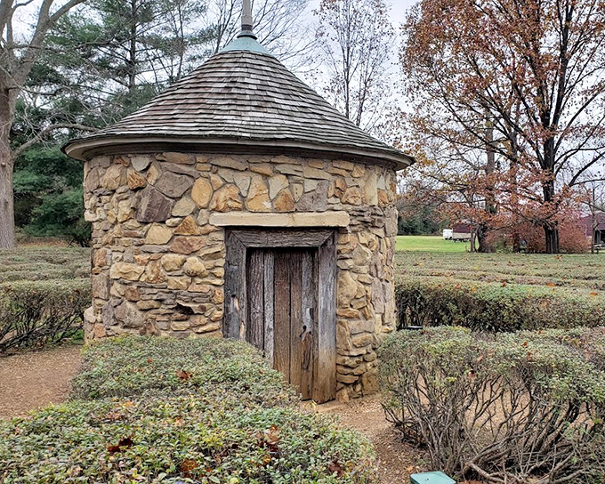 The stone grotto stands like a medieval fortress, weathered but dignified after centuries of sheltering contemplative souls.