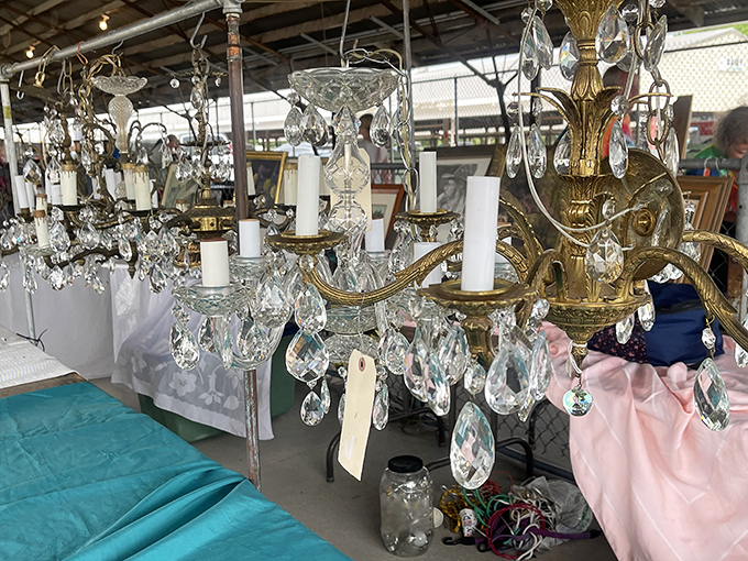 Crystal chandeliers dangle like frozen fireworks, waiting to transform ordinary ceilings into statements of unexpected elegance.