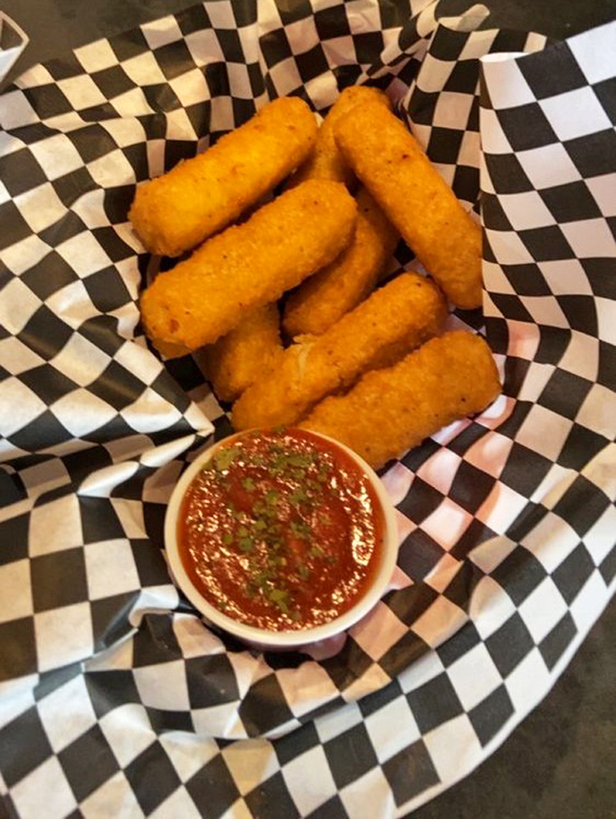 Golden-fried mozzarella sticks with marinara are the appetizer that nobody ever regrets ordering, ever, period.