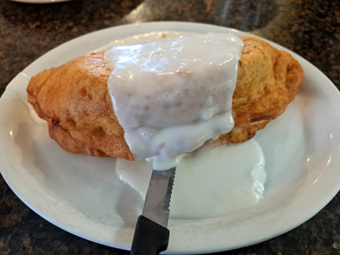 This isn't just a fritter&mdash;it's what happens when pastry chefs dream big and calories take a holiday. Worth every delicious moment of guilt.