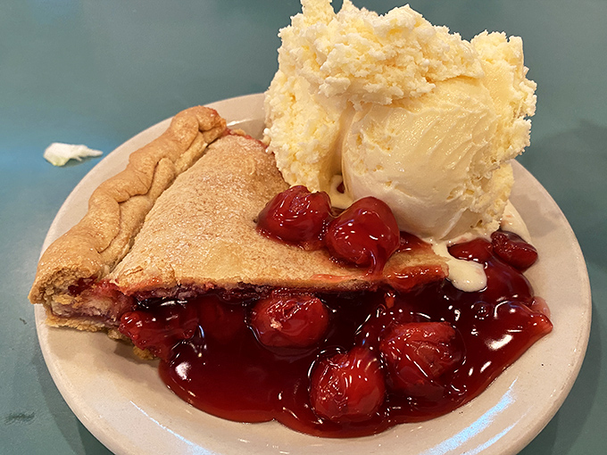 Cherry pie à la mode that makes you understand why Agent Cooper was so obsessed in Twin Peaks—tart cherries, flaky crust, and melting vanilla ice cream.
