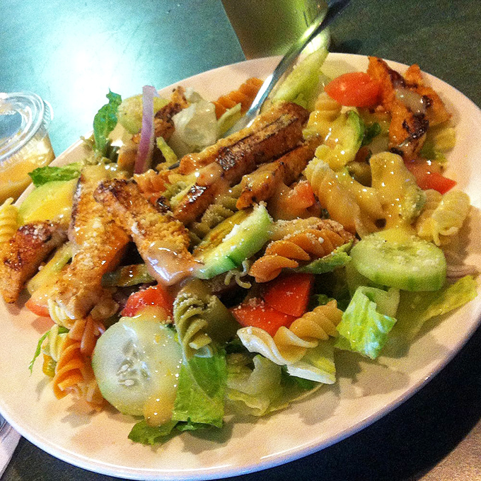 A pasta salad that makes other pasta salads question their life choices. Fresh vegetables and grilled chicken transform this side dish into the main event.