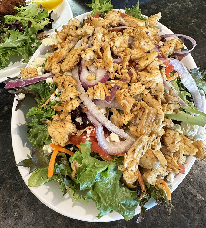 A chicken salad that makes eating greens feel like cheating on your diet with something decadent. Who knew healthy could look this good?