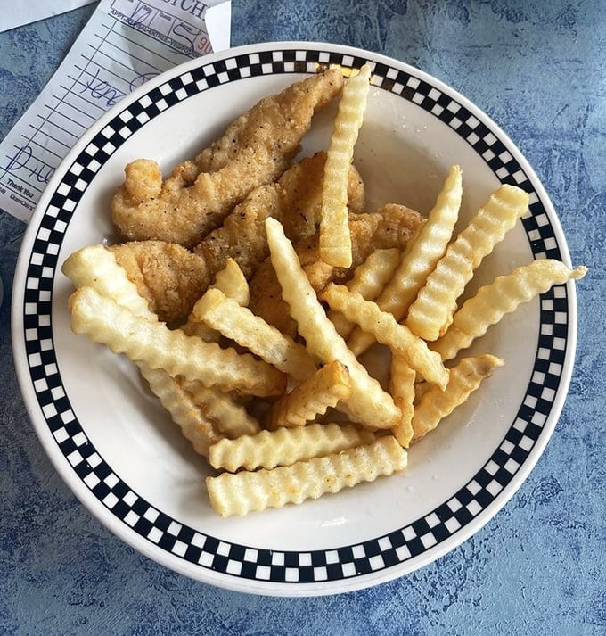 Golden-brown chicken tenders and crinkle-cut fries&mdash;because sometimes the inner child deserves to order breakfast for the grown-up.
