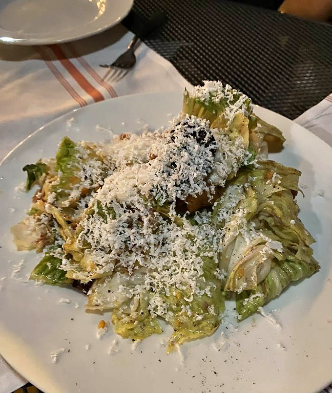 Chicory's natural bitterness tamed by a snowfall of Parmesan. This salad balances earthy, bitter, and salty notes in perfect Mediterranean harmony.