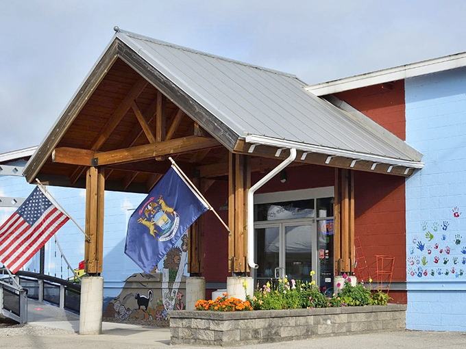 This cheerful entrance with its flags and flowers doesn't just welcome visitors&mdash;it practically gives them a warm northern Michigan hug.