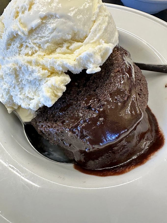 Chocolate cake so moist it borders on pudding, topped with ice cream melting into warm rivers of chocolatey bliss.