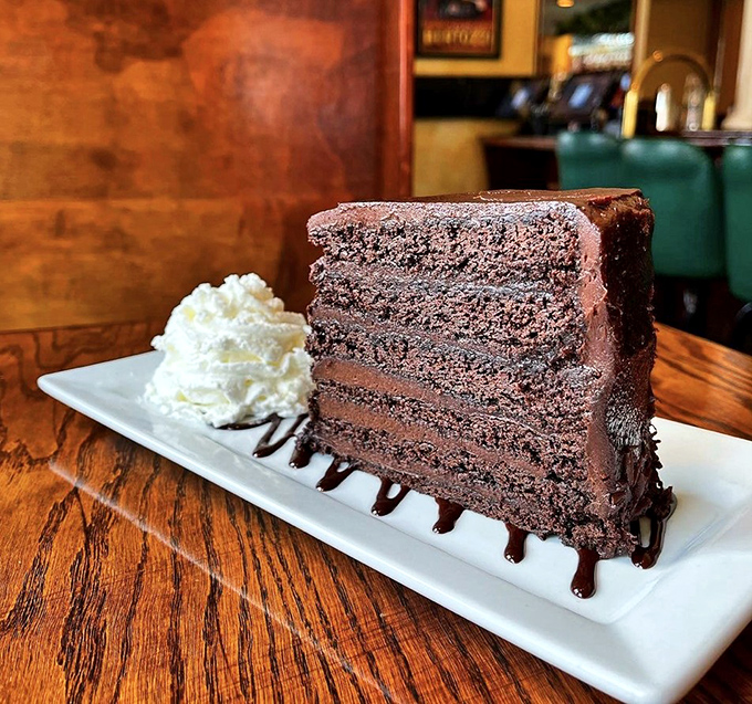A chocolate cake so decadent it should come with its own warning label and possibly a permission slip from your cardiologist.