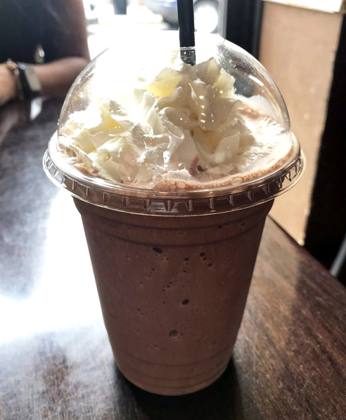 This chocolate shake topped with whipped cream isn't just a drink &ndash; it's what happiness would look like if it took liquid form.