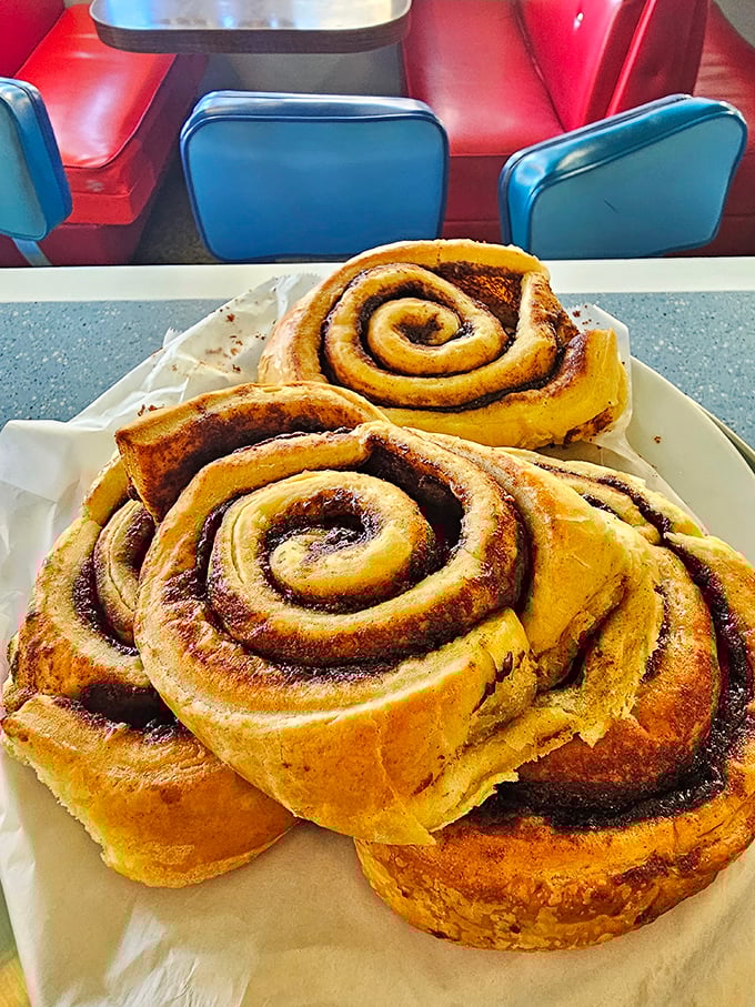 Cinnamon rolls the size of your face because Rae's understands that breakfast pastries should require strategic planning to finish.
