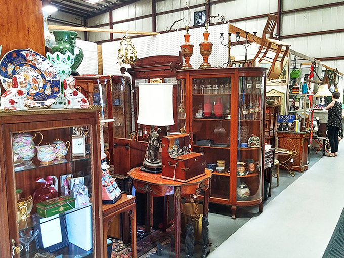 Mahogany meets memories in this furniture display. These cabinets have probably held more secrets than a therapist's office.
