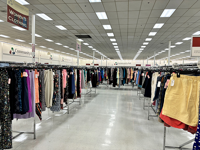 The women's clothing section: where patience transforms into style. Each hanger holds a possibility, each rack a runway waiting to happen.