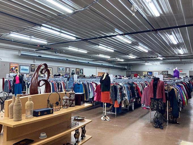 Clothing racks stand like colorful soldiers, each garment holding the potential to become your next favorite outfit or conversation-starting piece.
