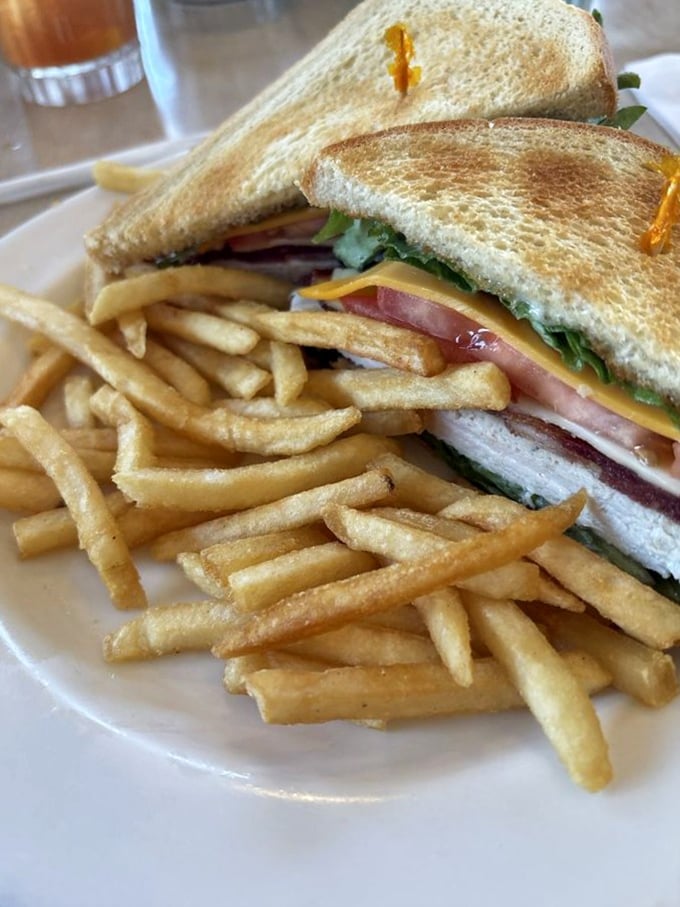The club sandwich—mankind's greatest architectural achievement since the pyramids, but significantly more delicious and easier to finish in one sitting.
