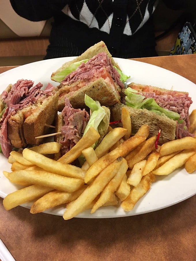 The club sandwich&mdash;architectural marvel of the diner world&mdash;stacked high with layers of meat, crisp lettuce, and toast that's held together by physics and toothpicks.