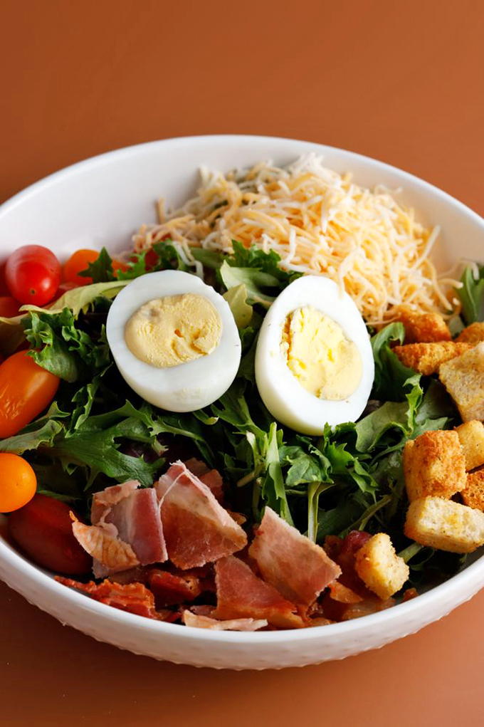 This Cobb salad isn't just a healthy choice&mdash;it's a colorful celebration where bacon, eggs, and veggies throw the kind of party your diet actually approves of.
