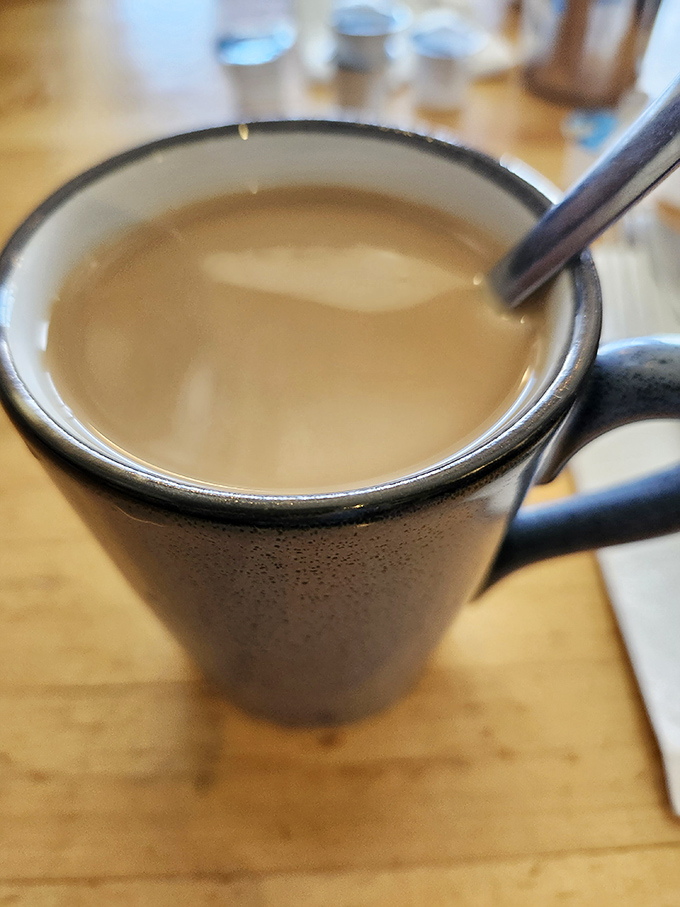 That first sip of diner coffee—when the caffeine hasn't kicked in yet, but the promise of it already makes you feel better.