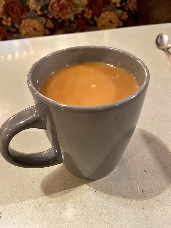 That coffee isn't just a beverage—it's liquid motivation in a sturdy mug, ready to transform morning zombies into functioning humans.